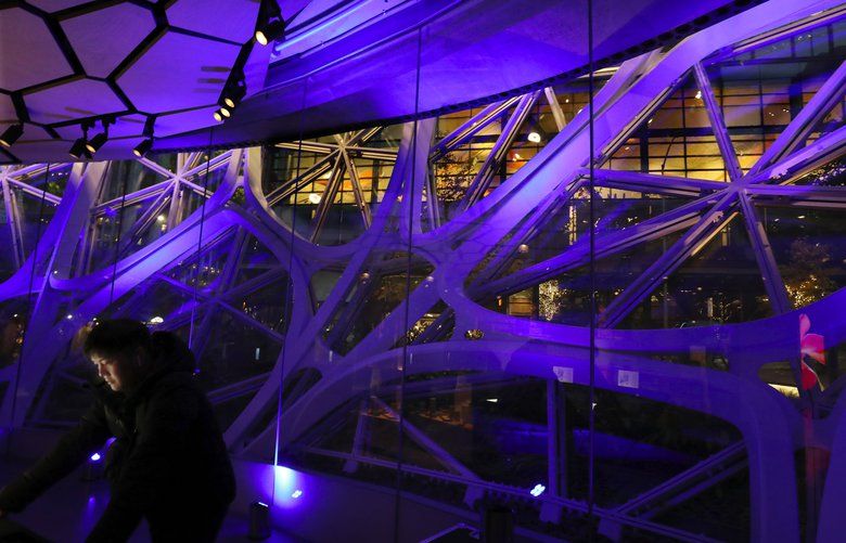 Seattle and beyond go blue in tribute to Paul Allen | The Seattle Times