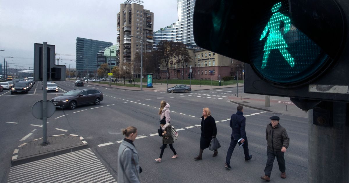 Lithuania marks female suffrage with crossing lights | The Seattle Times
