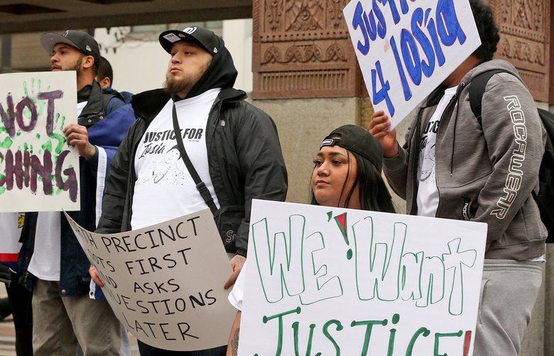 Protesters march through downtown Seattle, decrying fatal New Year’s ...