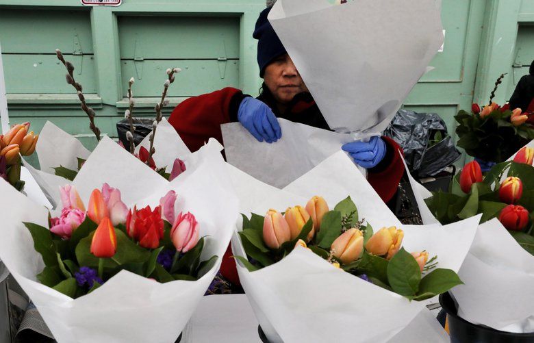 A day when love flowers at Seattle’s Pike Place Market | The Seattle Times