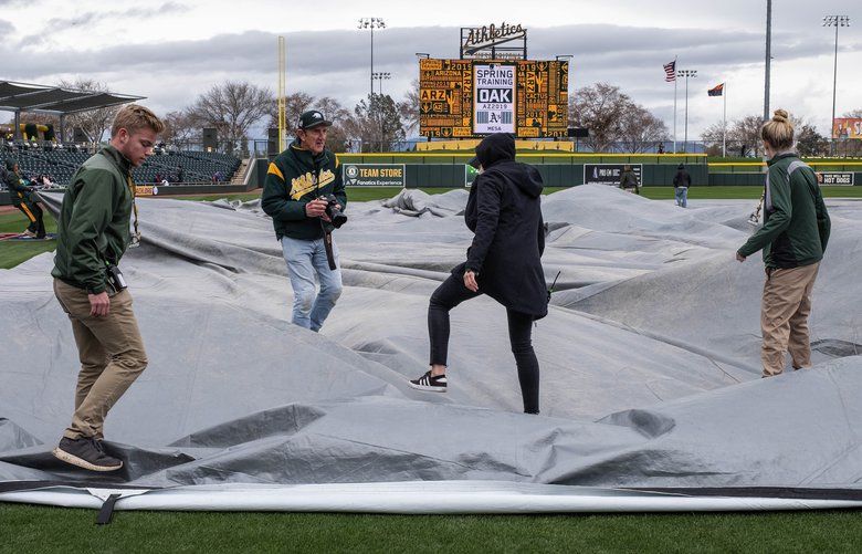 Expected rain arrives and scuttles the Mariners’ Cactus League opener ...