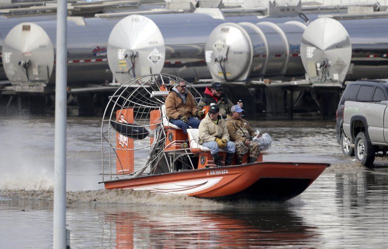Homes flood as Missouri River overtops, breaches levees | The Seattle Times