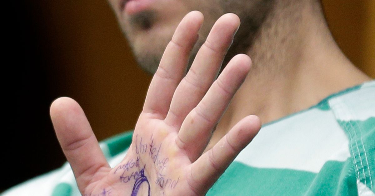 Mobster hit suspect shows symbol linked to conspiracy theory | The ...