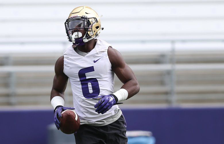 Former Huskies RB Deontae Cooper is back on the football field — as ...