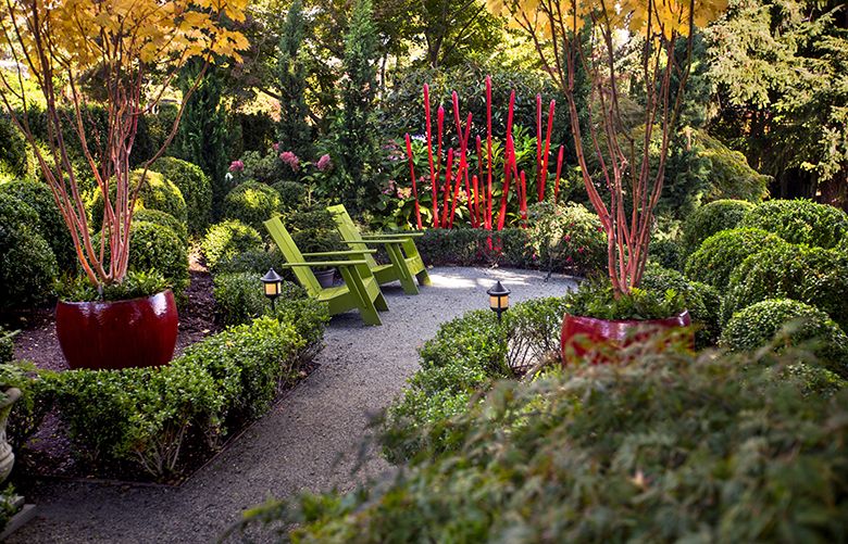 Harmonious symmetry, shapes and consistency balance a manicured garden ...