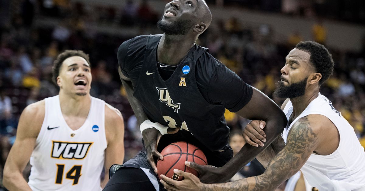 Tacko Fall among 11 players added to NBA draft combine | The Seattle Times