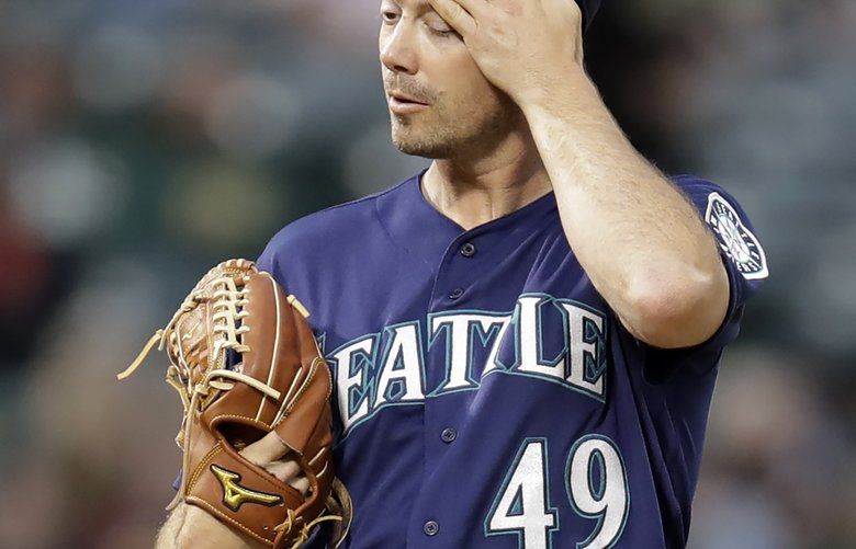 Mariners stay with a five-man pitching rotation, move lefty Wade ...