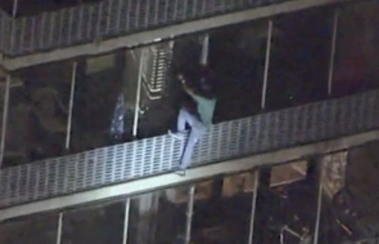 Man scales down Philadelphia high-rise to escape smoky fire | The ...