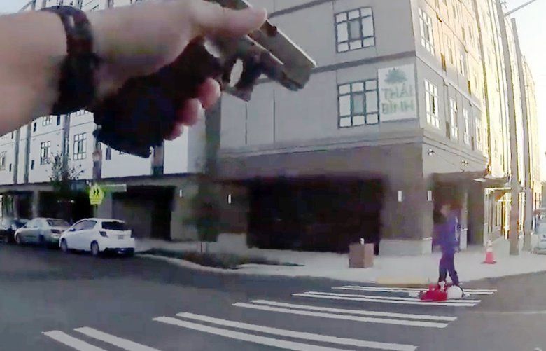 Body-cam video shows Seattle police firing at, wounding woman in ...