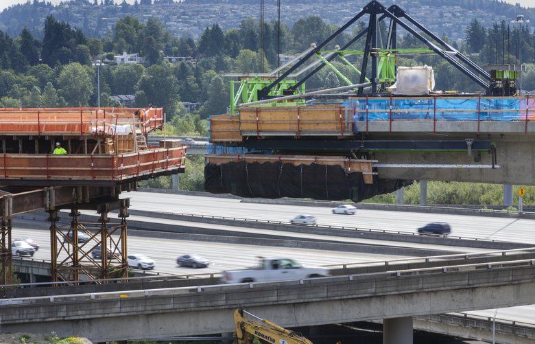 The light-rail bridge being built in south Bellevue seems to soar ...