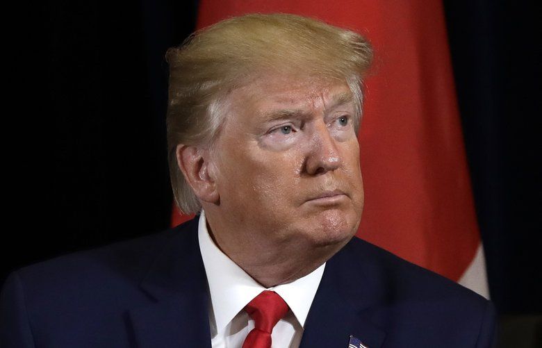 Vandals hack Seattle road sign to display call for impeachment | The ...