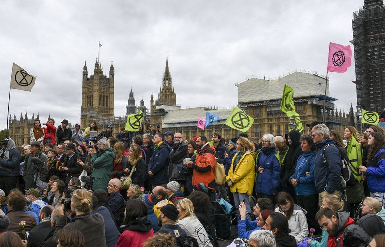 Climate activists block roads, march in global protests | The Seattle Times