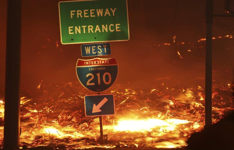 Fast-moving fire drives thousands from California homes | The Seattle Times
