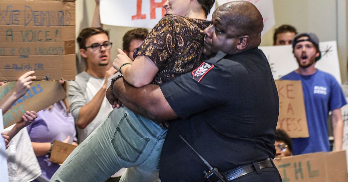 Ole Miss names chancellor despite protest ending ceremony | The Seattle ...