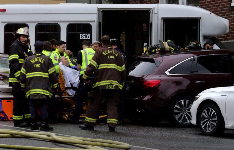 King County Metro Access bus hits building on First Hill | The Seattle ...