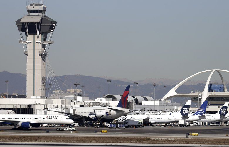 Boeing 777 with flaming engine returns safely to LA airport | The ...
