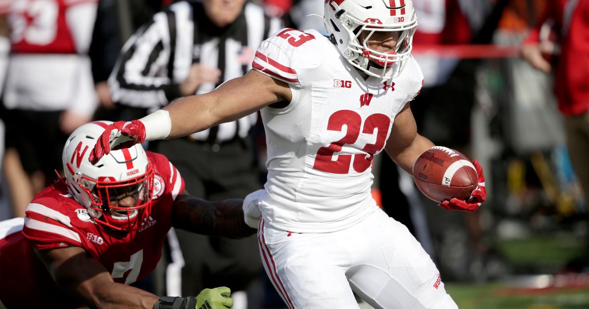 Taylor over 200 again in No. 15 Badgers’ 37-21 win over Neb | The ...