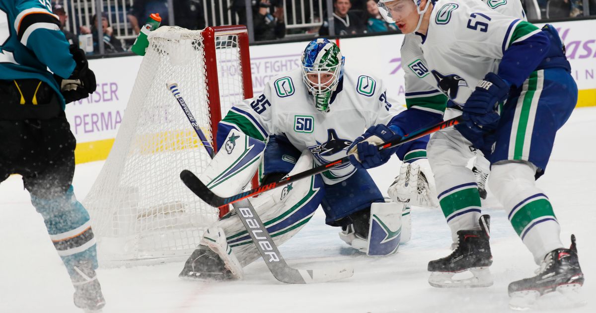 Pettersson scores twice, Canucks beat Sharks 5-2 | The Seattle Times