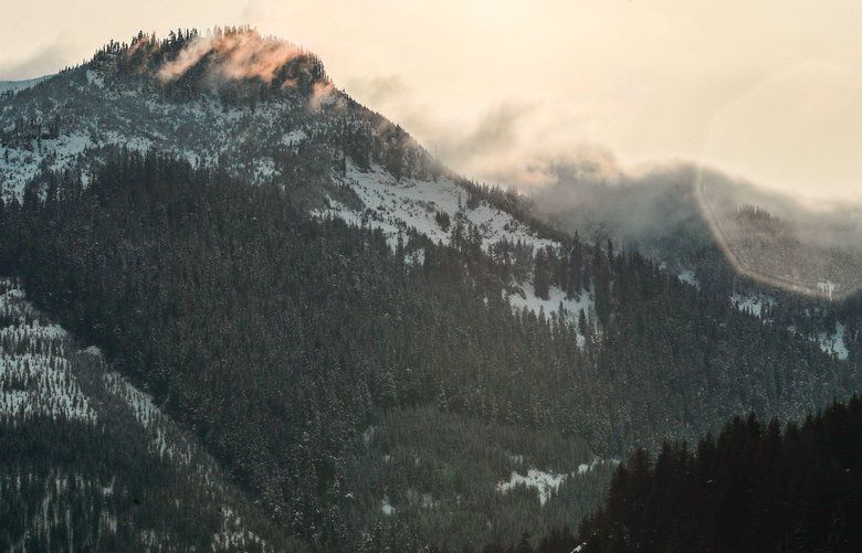 Seattle area ‘flirting’ with a chance of snow; mountain passes get a ...