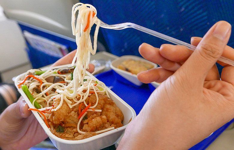 The correct etiquette for eating and drinking on a plane | The Seattle ...