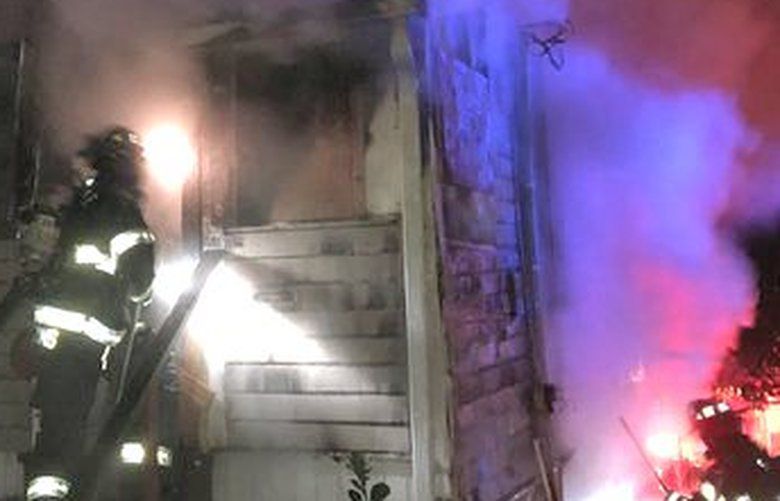 Seattle firefighters douse fire in vacant home on Aurora Avenue North ...