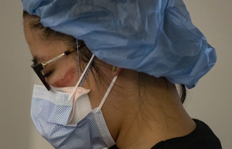 Nurses weigh their principles vs safety in virus fight | The Seattle Times