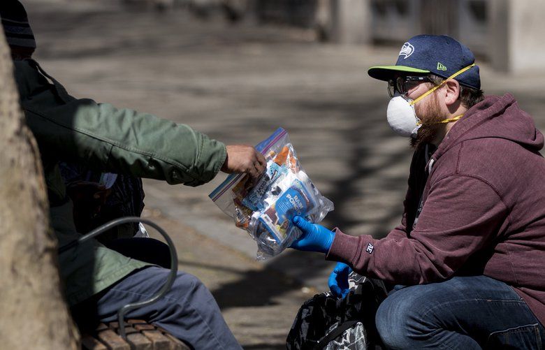 Downtown Seattle’s streets are almost empty, save for homeless and ...