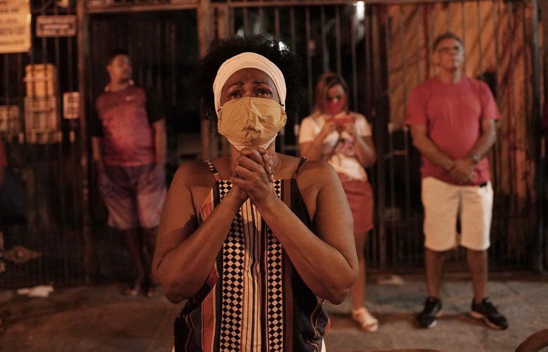 Photos of the day: What social distancing looks like across the globe ...