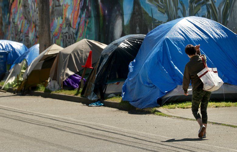 Seattle officials feud over the future of tent encampments during ...