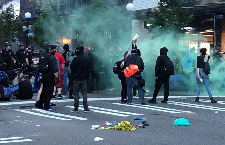 Sparked by death of George Floyd, Seattle protesters clash with police ...