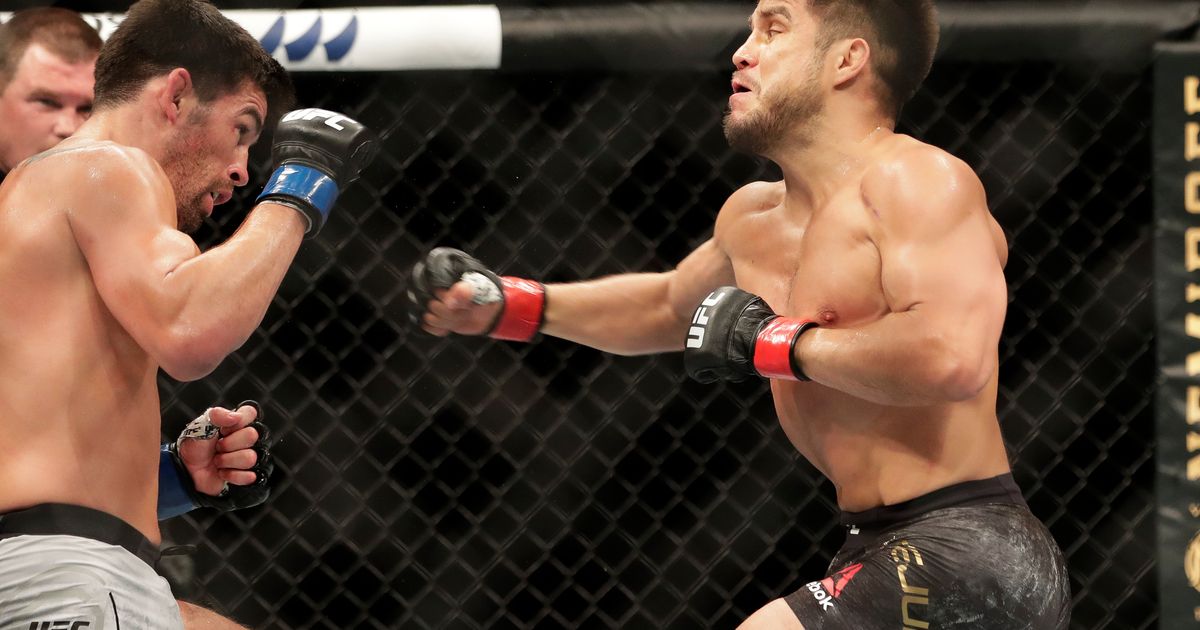 UFC 249 ushers in fan-free, mask-filled era of sports | The Seattle Times
