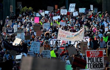 After a full month of protests, demonstrators bring march to Seattle ...
