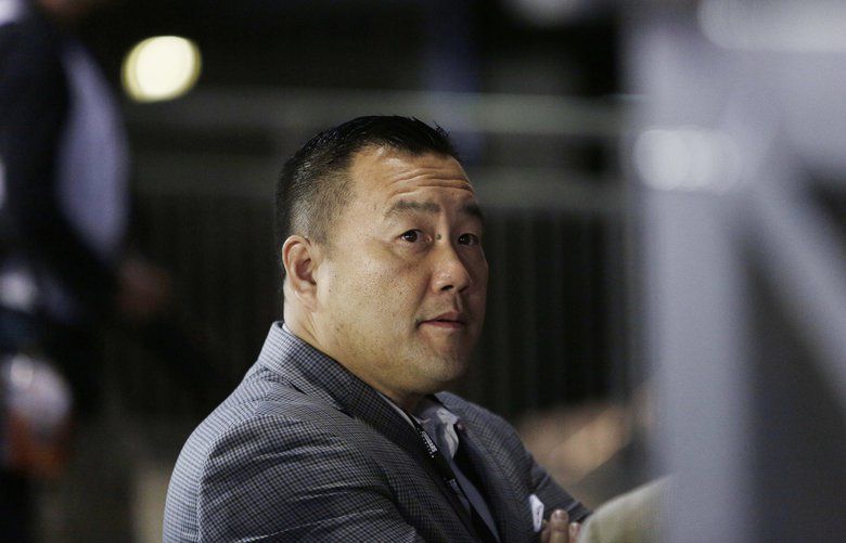 WSU athletic director Pat Chun, football coach Nick Rolovich and others ...