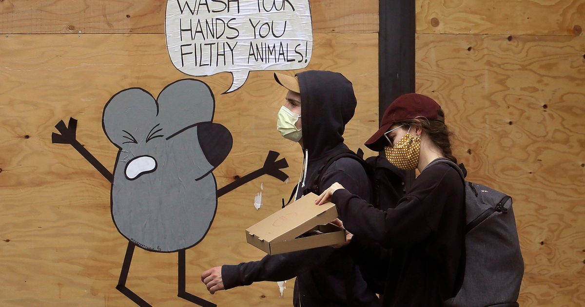 Masks and social distancing work, new analysis finds | The Seattle Times