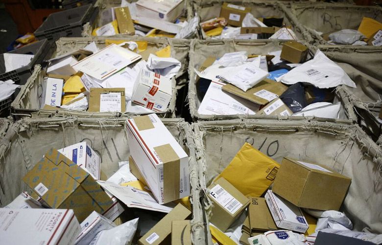Mail backlog raises fears of delays in ballot delivery | The Seattle Times