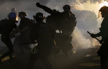 Portland protesters set fire to county government building | The ...