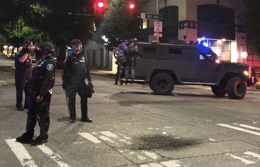 Fire set outside Seattle police precinct, Capitol Hill windows smashed ...