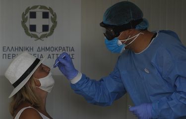Greece battles coronavirus resurgence after early success | The Seattle ...
