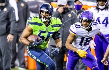 K.J. Wright has tennis balls to thank for his one-handed interception ...