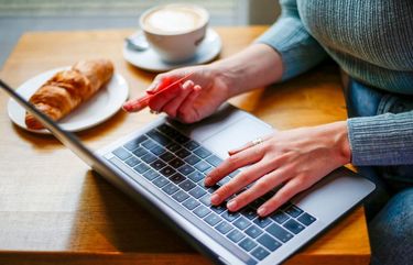 How do I improve weak Wi-Fi connection to a printer at the other side ...