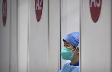 China builds new quarantine center as virus cases rise | The Seattle Times