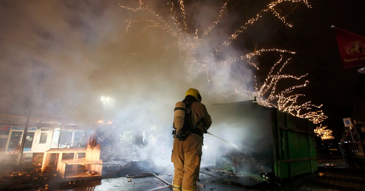 Dutch police use tear gas, water cannon amid rioting | The Seattle Times