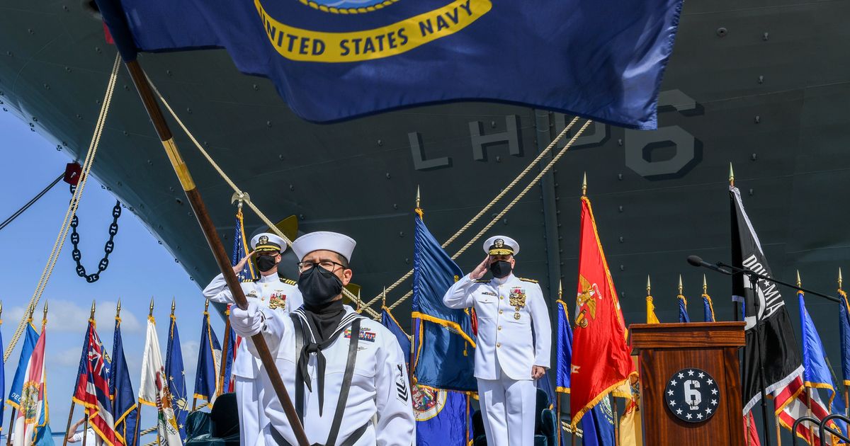 US Navy decommissions massive ship destroyed by fire | The Seattle Times
