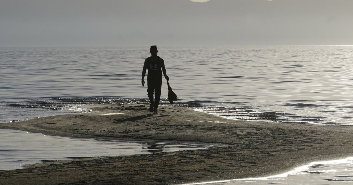 Water levels at Great Salt Lake drop to historic low | The Seattle Times