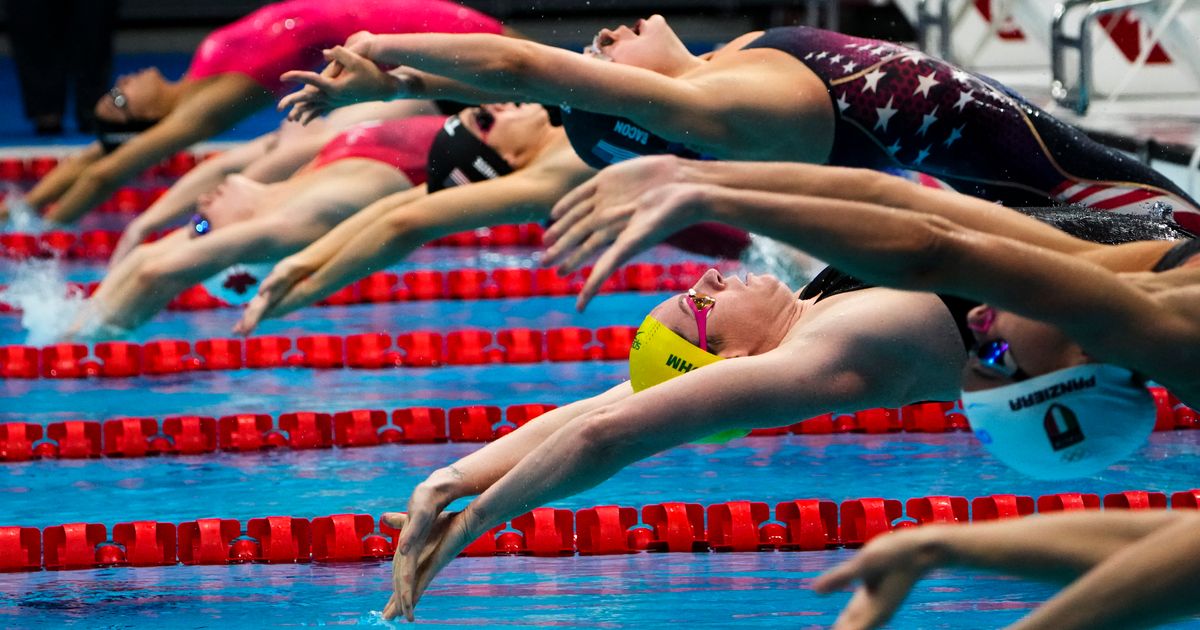 GLIMPSES: Olympic swimmers, reaching for victory | The Seattle Times