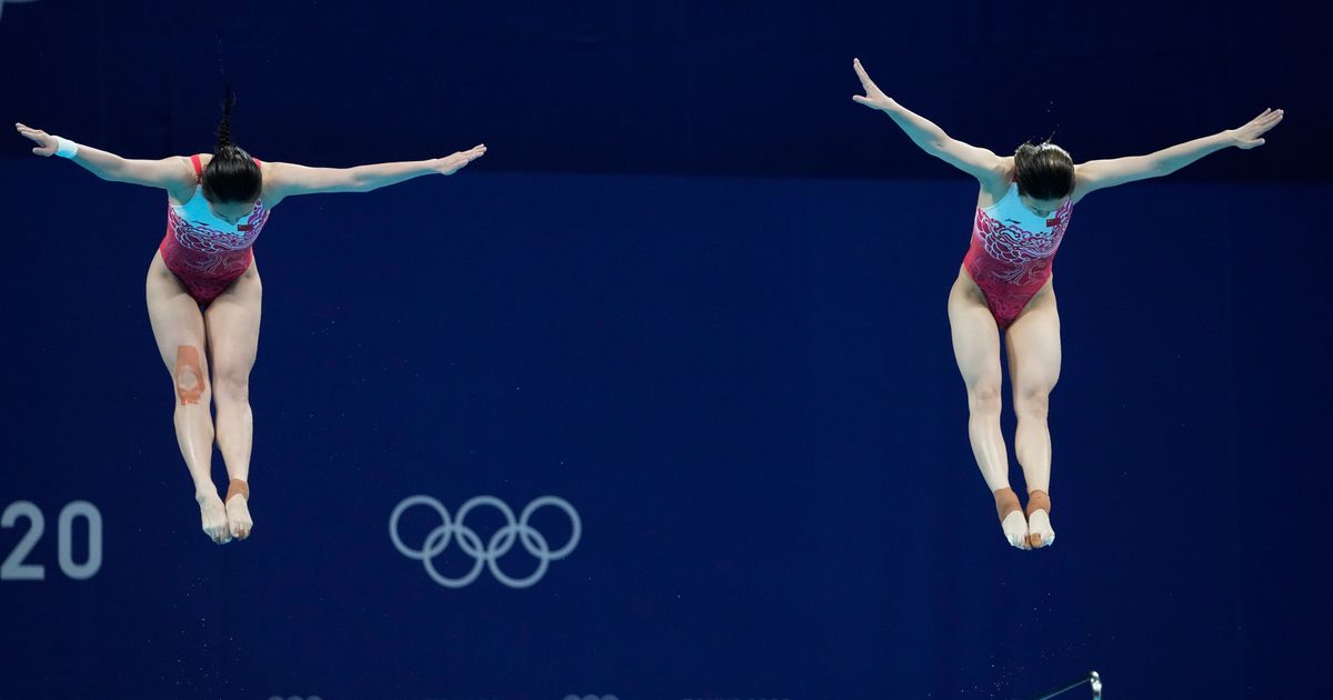 Chinese duo easily win 1st diving gold of Tokyo Olympics | The Seattle ...