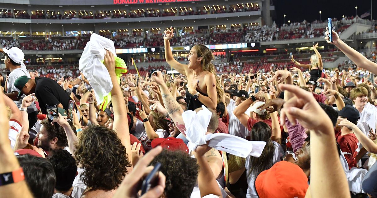 Arkansas fined after fans rush field following win vs Texas | The ...