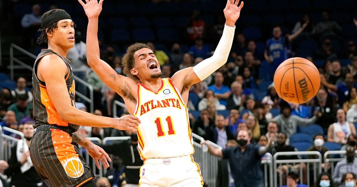 Young overcomes neck injury, Hawks beat Magic 111-99 | The Seattle Times