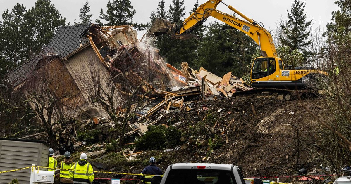 Crews demolish Bellevue home that slid downhill during January ...