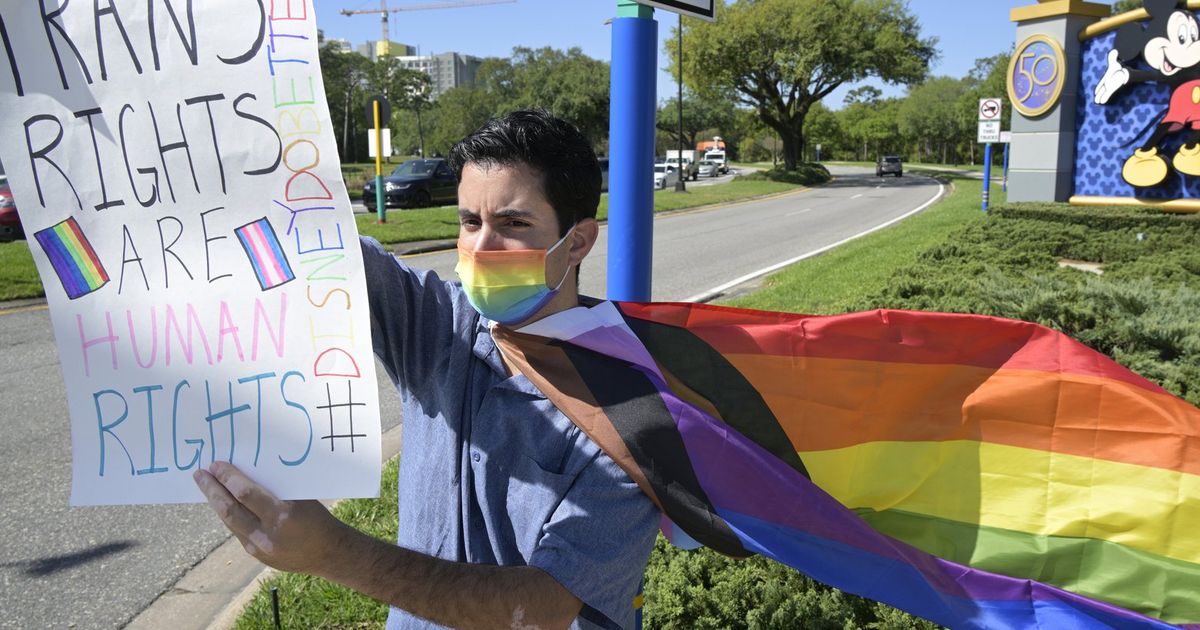 Disney in balancing act as some workers walk out in protest | The ...